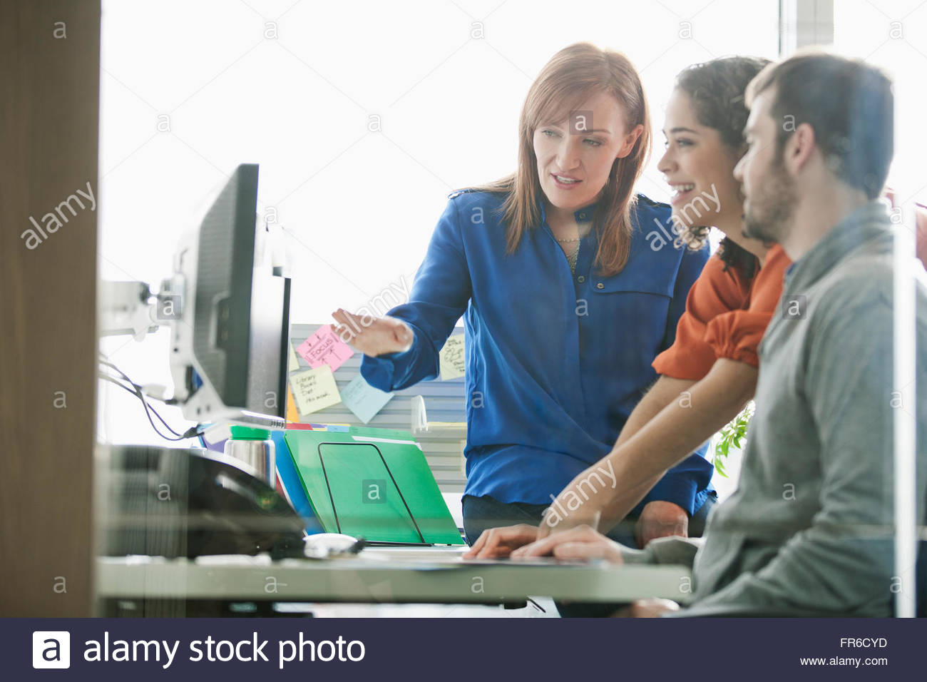 small group of office workers in discussion Stock Photo - Alamy