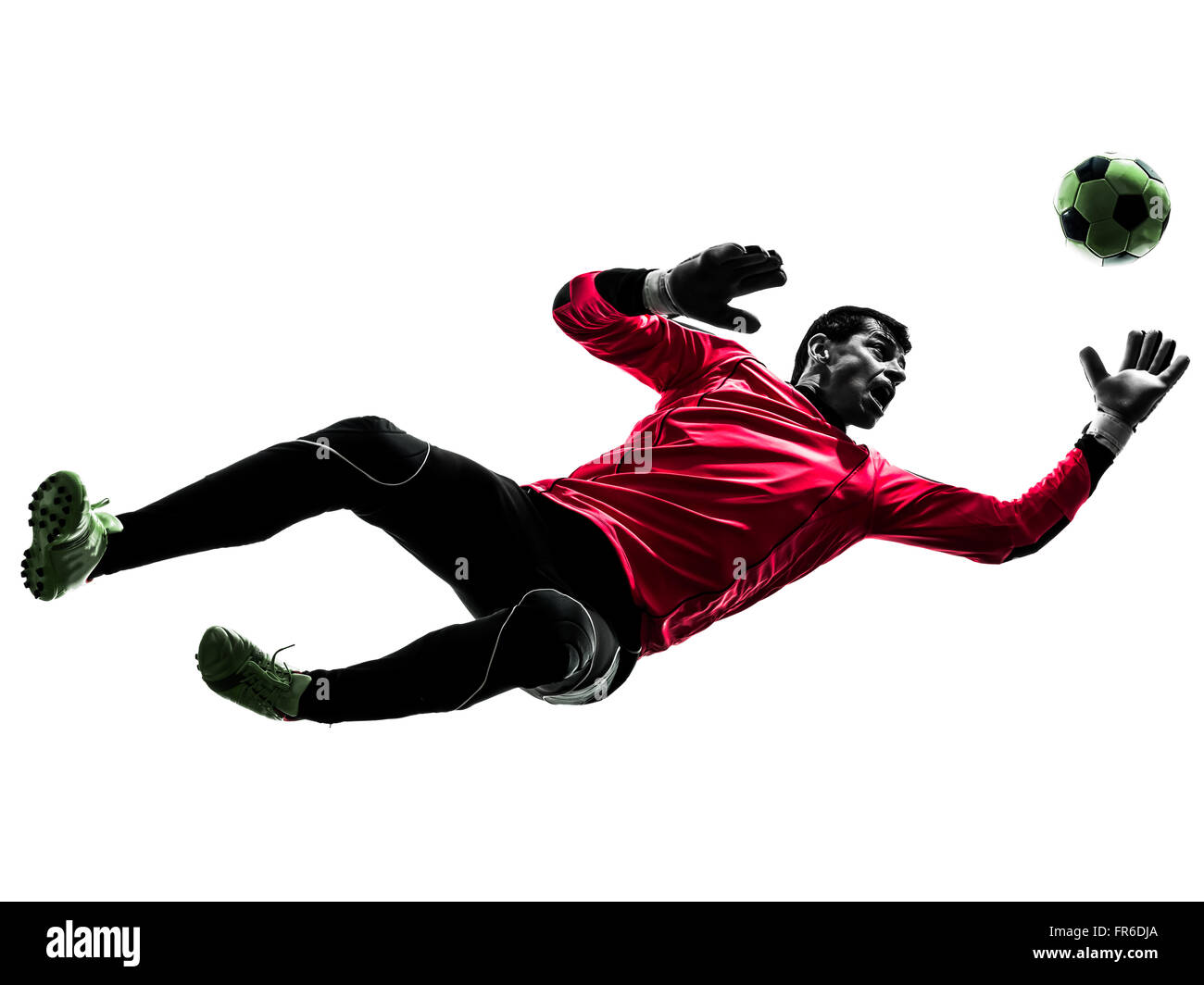 one soccer player goalkeeper man jumping in silhouette isolated white ...