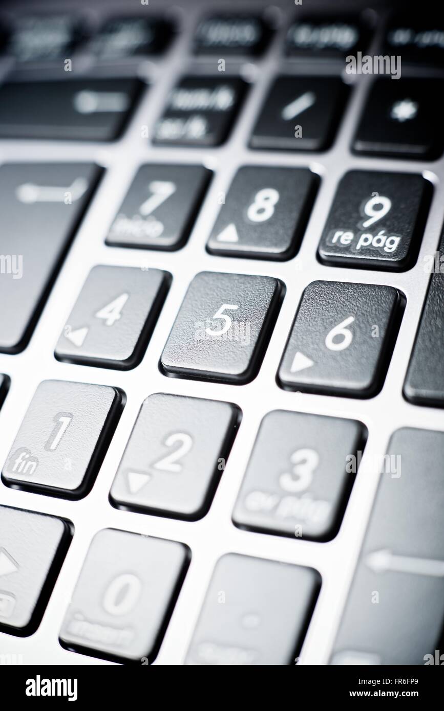 Forefront of a gray laptop keyboard Stock Photo - Alamy