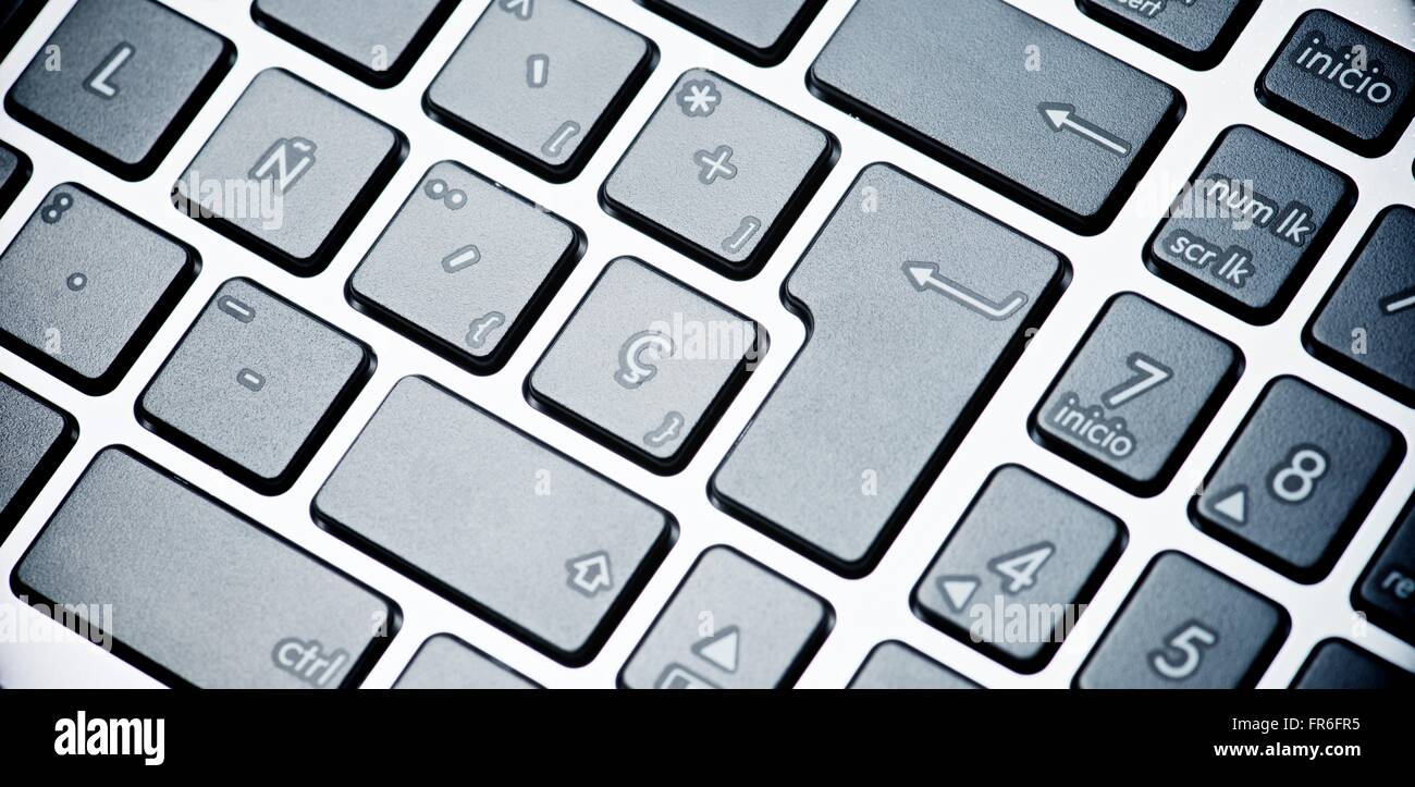 Forefront of a gray laptop keyboard Stock Photo - Alamy