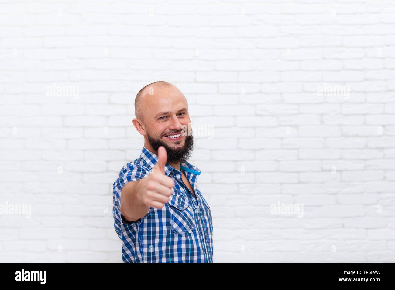 Casual Bearded Man Thumb Up Hand Gesture Smiling Stock Photo - Alamy