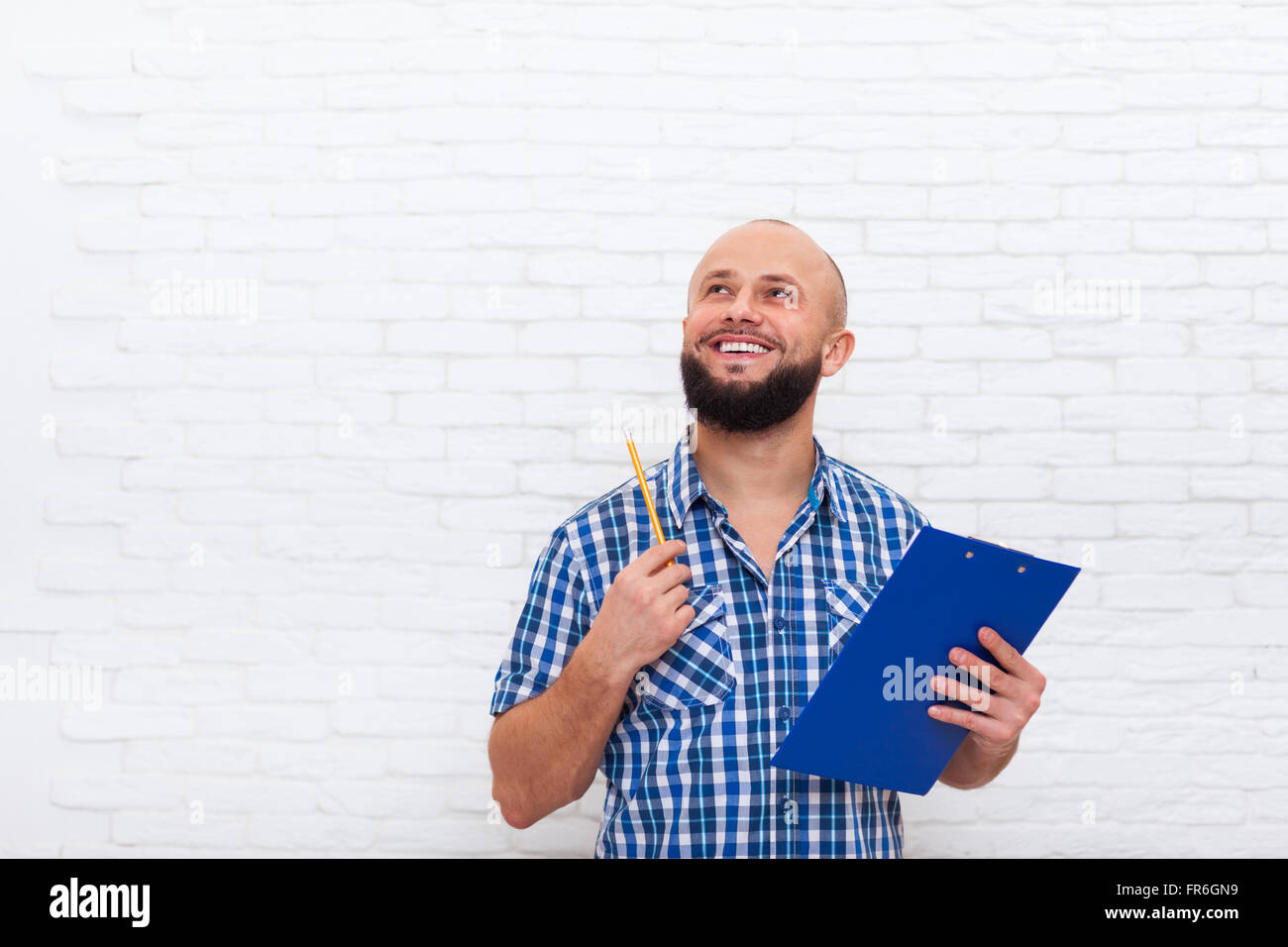 Casual Bearded Business Man Holding Folder Pencil Point Look Up To Copy ...