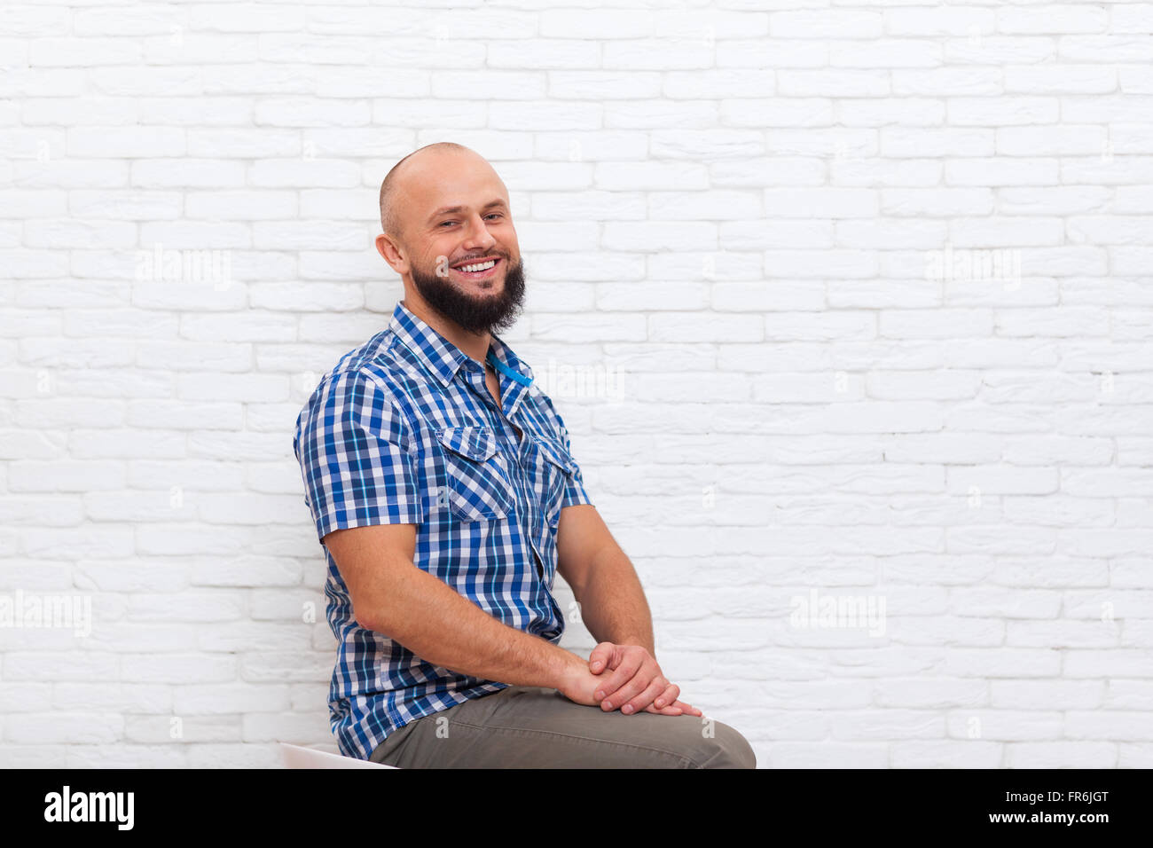 Casual Bearded Business Man Sitting Happy Smiling Office Stock Photo ... Casual Bearded Business Man Sitting Happy Smiling Office Stock Photo ...
