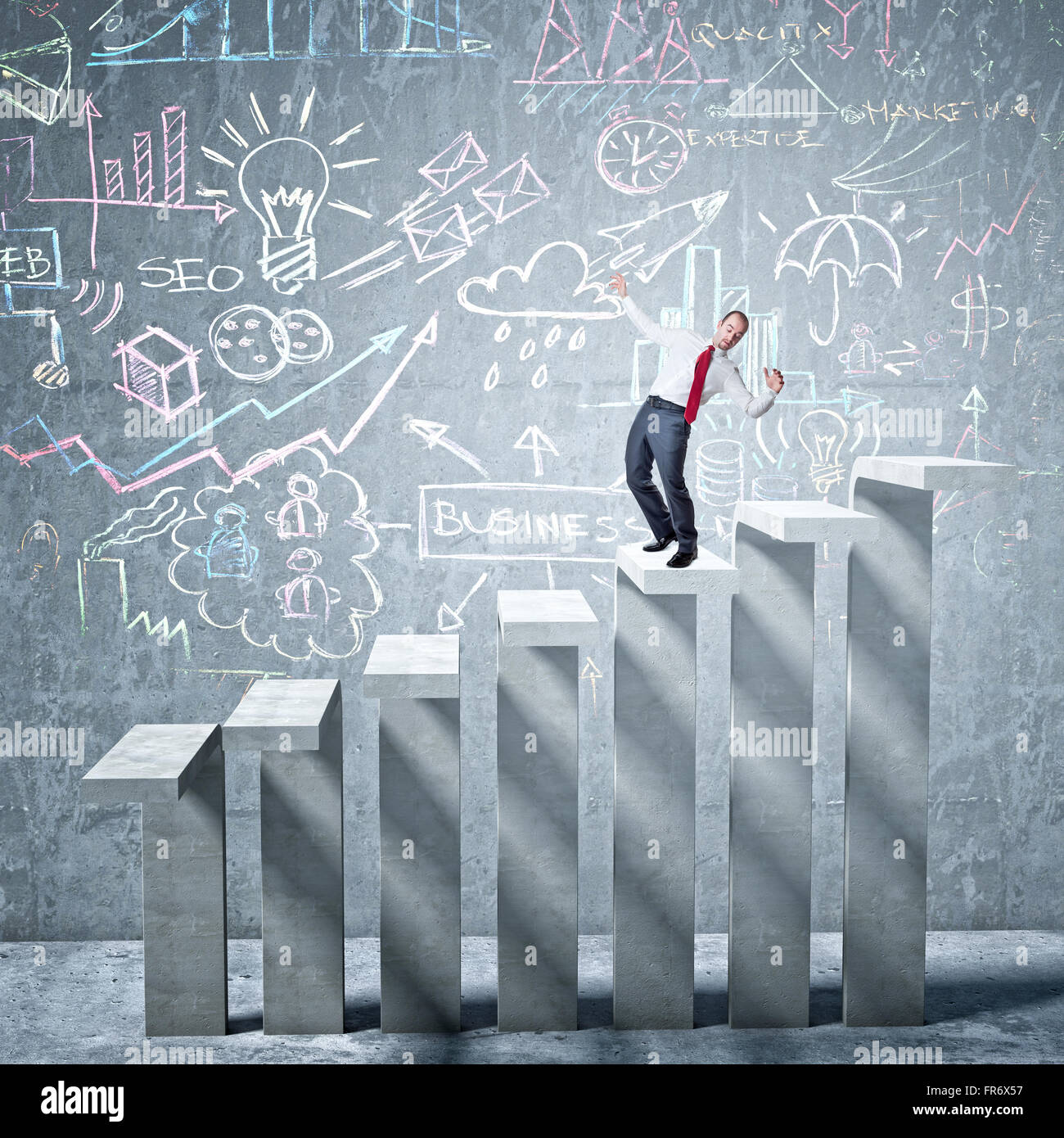 businessman balance on concrete stair Stock Photo - Alamy