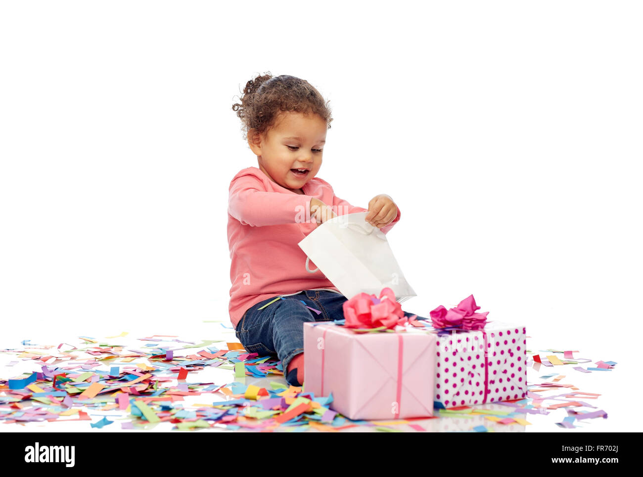 happy little baby girl with birthday presents Stock Photo - Alamy