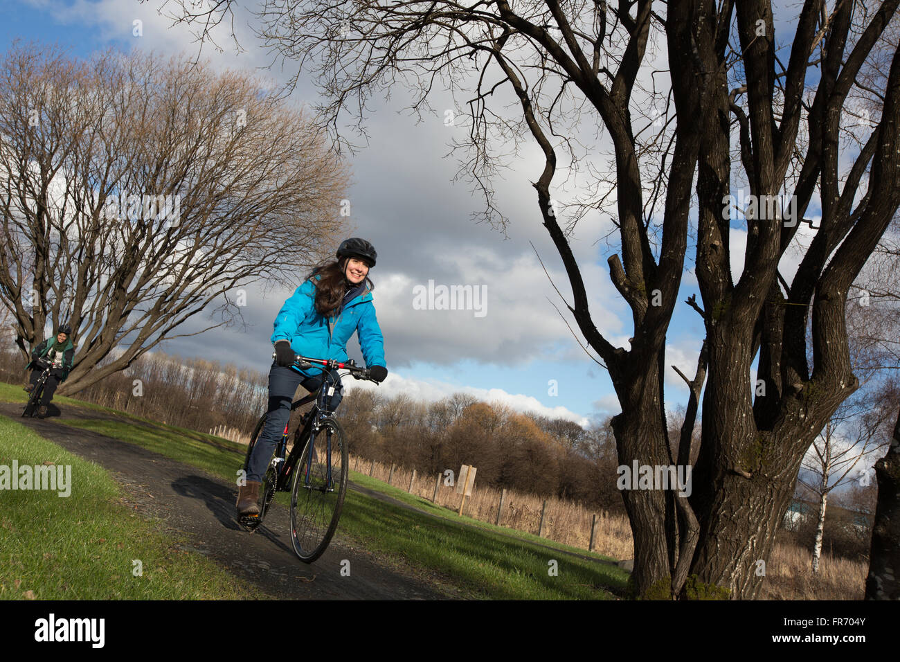 Cyclists using Cuningar Loop woodland park, in Rutherglen, Glasgow ...