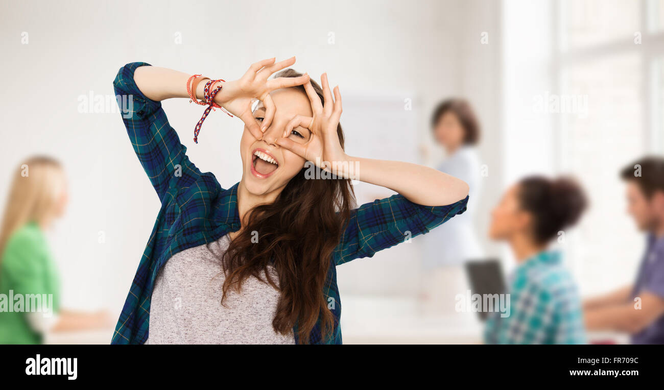 happy student girl making face at school Stock Photo - Alamy