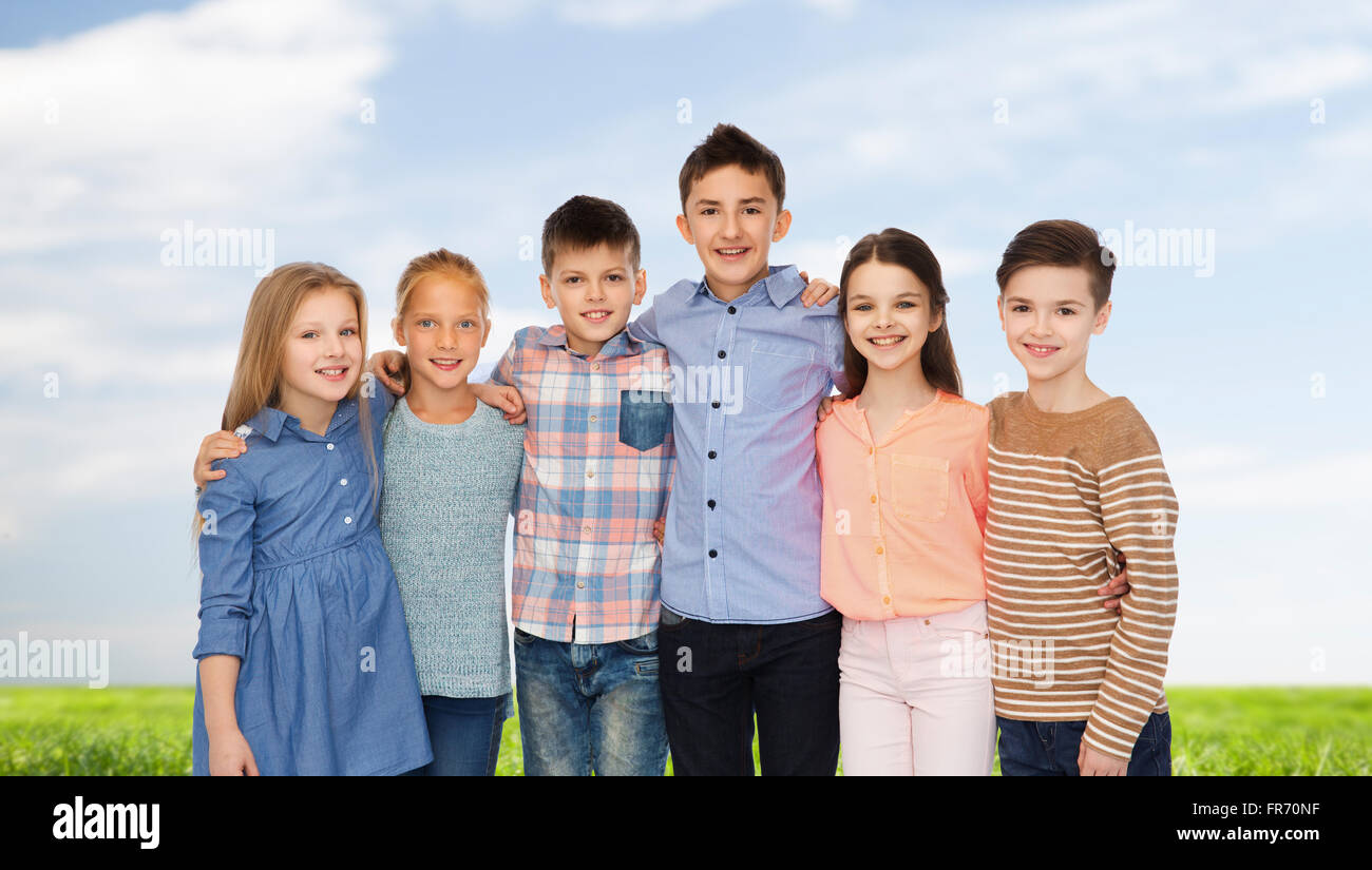 happy smiling children hugging Stock Photo - Alamy