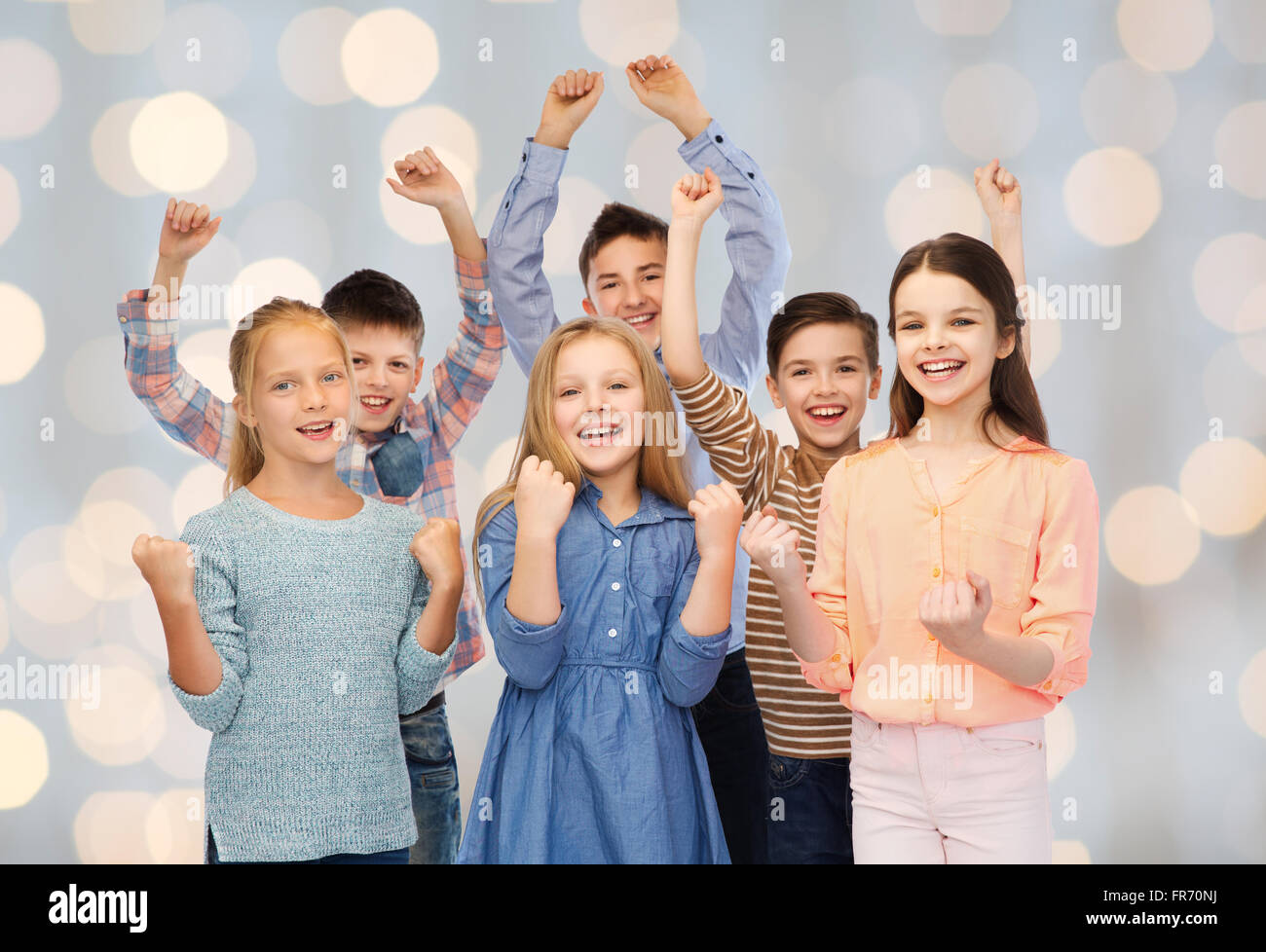 happy children celebrating victory Stock Photo - Alamy