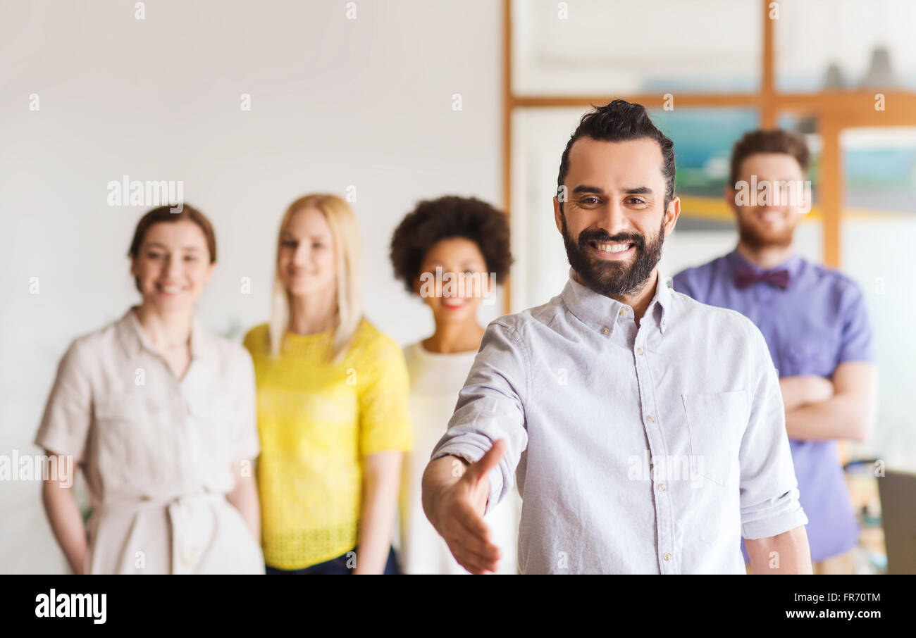 Multiethnic business team making deal hi-res stock photography and ...