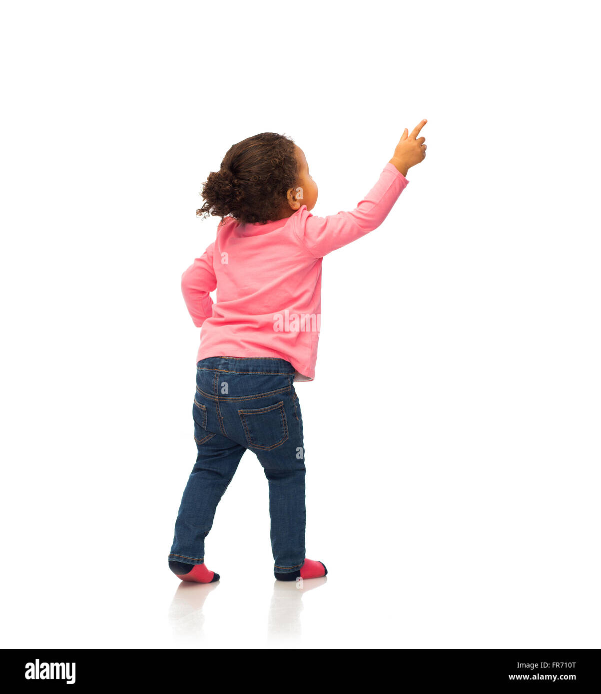 african baby girl pointing finger to something Stock Photo - Alamy