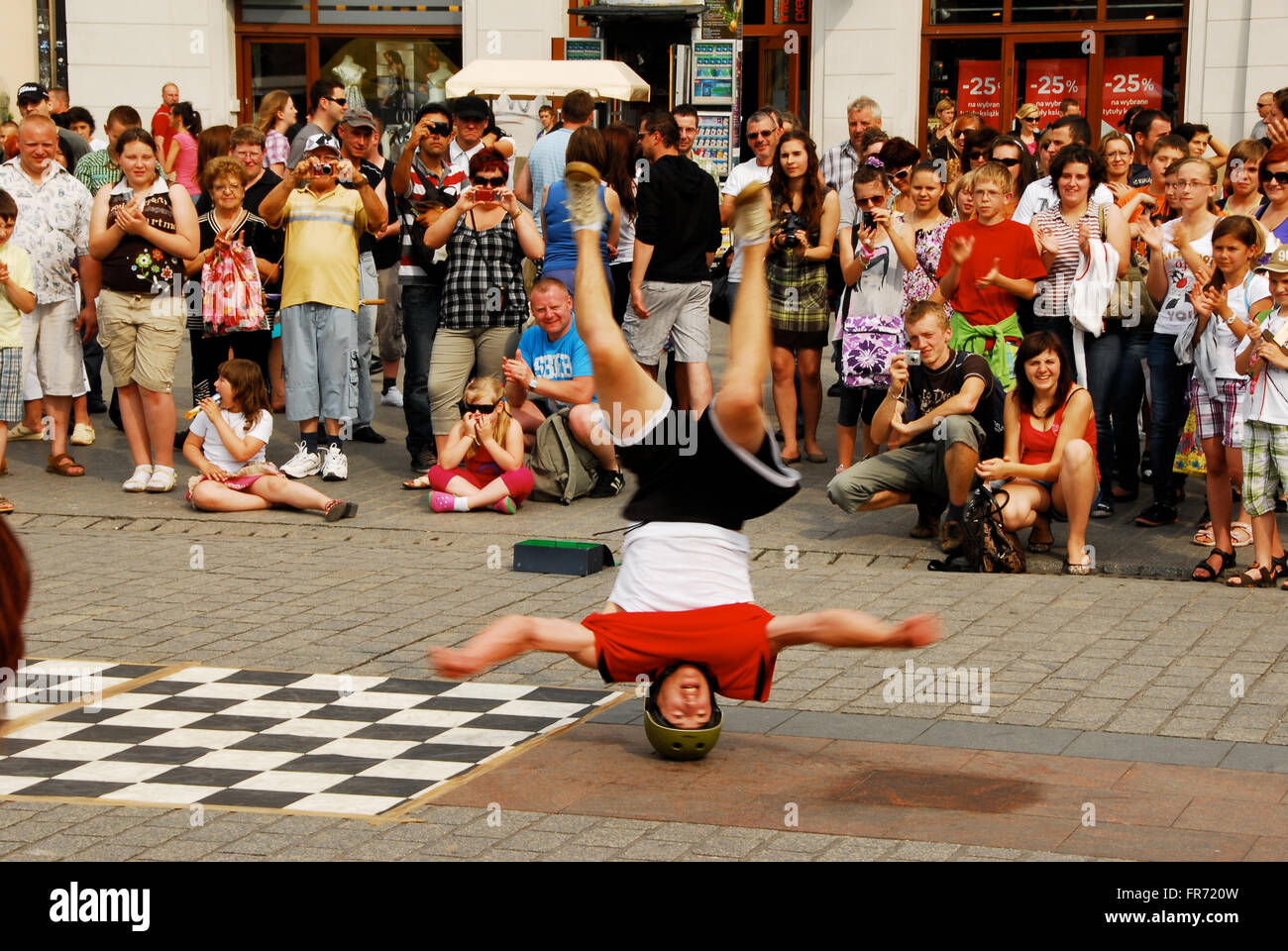 Street dancer spinning on his head Stock Photo - Alamy