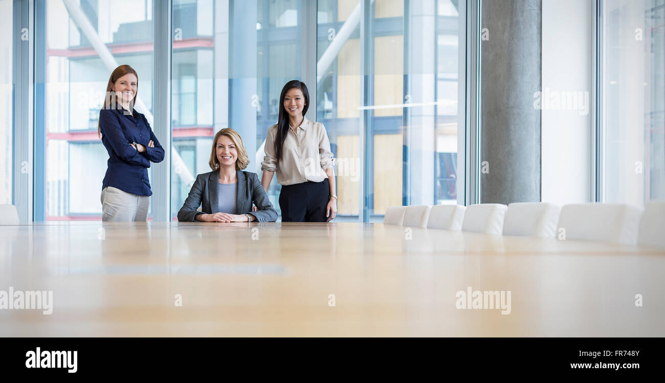 Surface level portrait confident businesswomen in conference room Stock ...