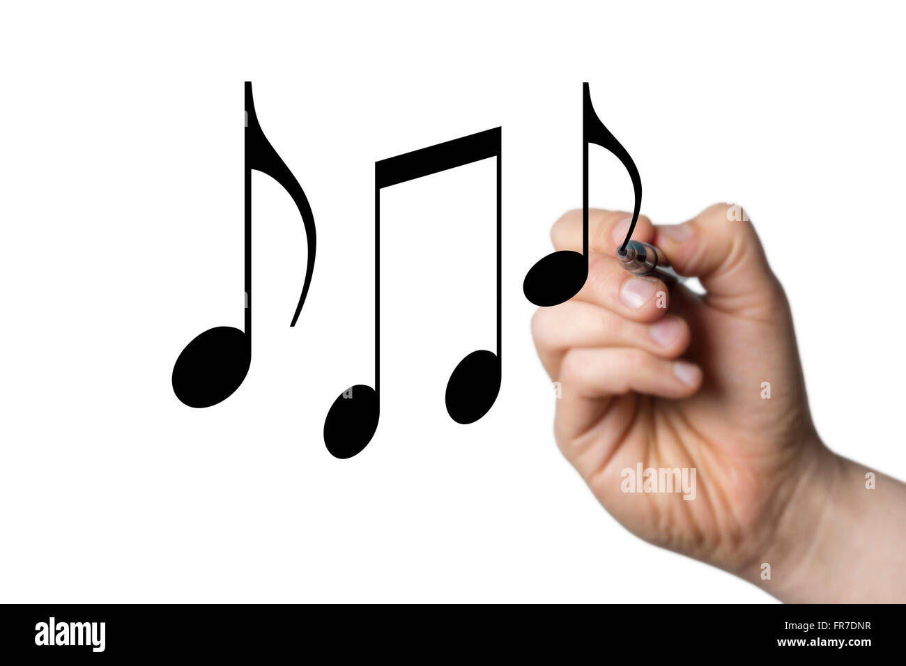 music notes drawn by a hand isolated on white background Stock Photo ...