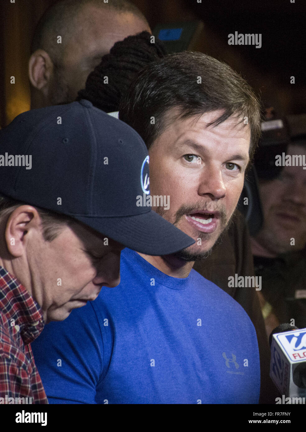 Mark and Paul Wahlberg at the grand opening of the Orlando Wahlburgers ...