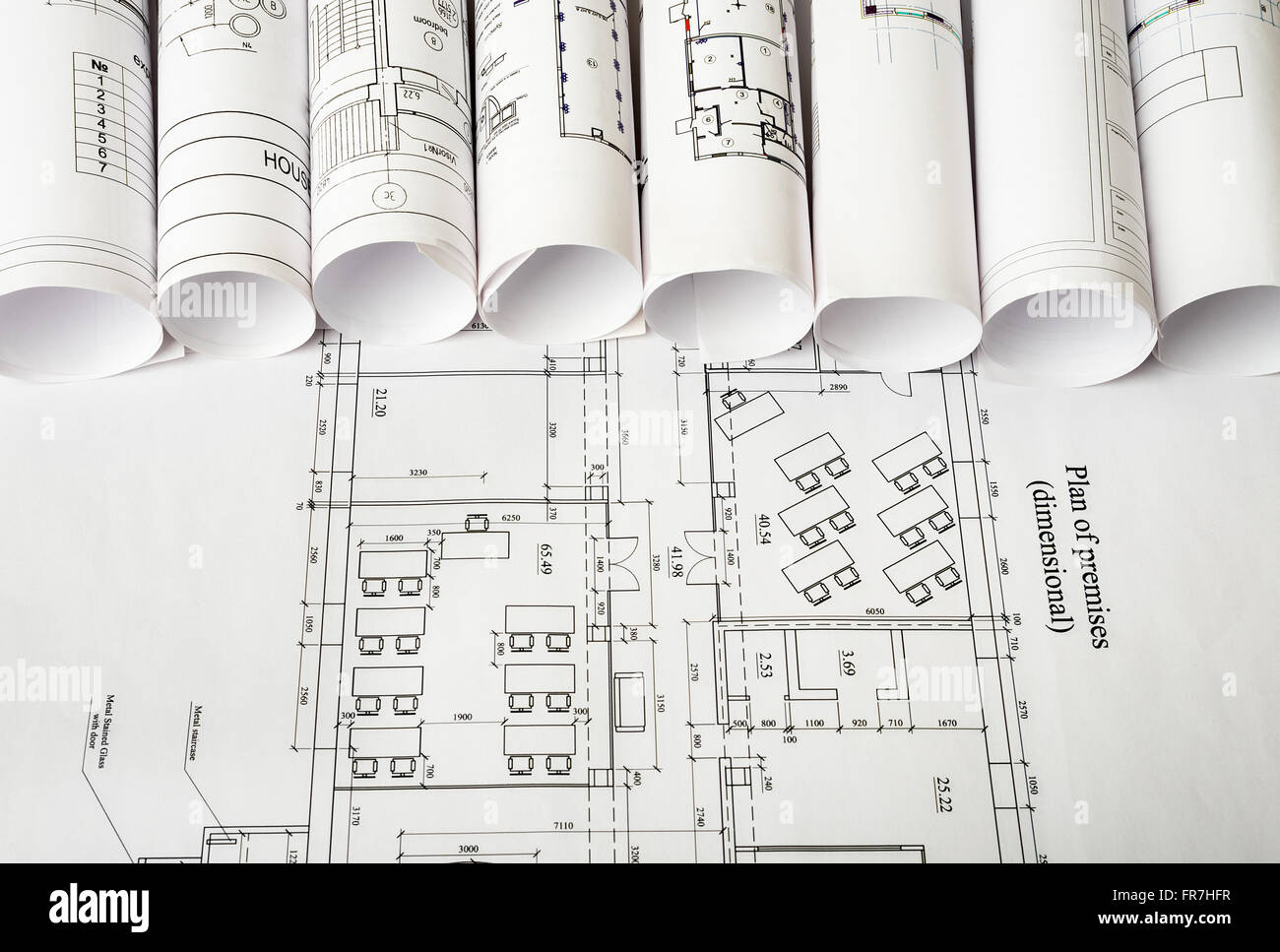 Architecture plan and rolls of blueprints Stock Photo - Alamy