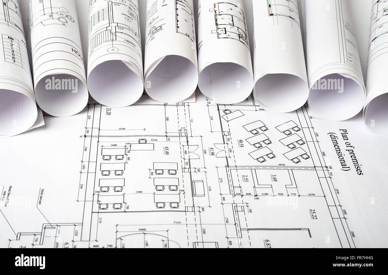 Architecture plan and rolls of blueprints Stock Photo - Alamy