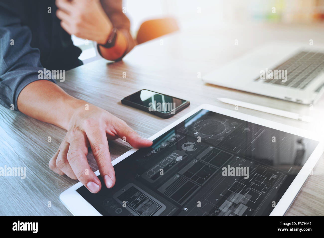 Website designer working digital tablet and computer laptop with smart ...
