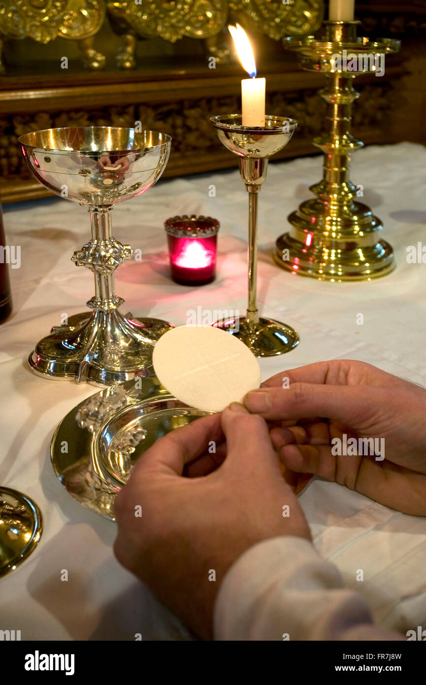 A priest begins Mass at his altar Stock Photo - Alamy