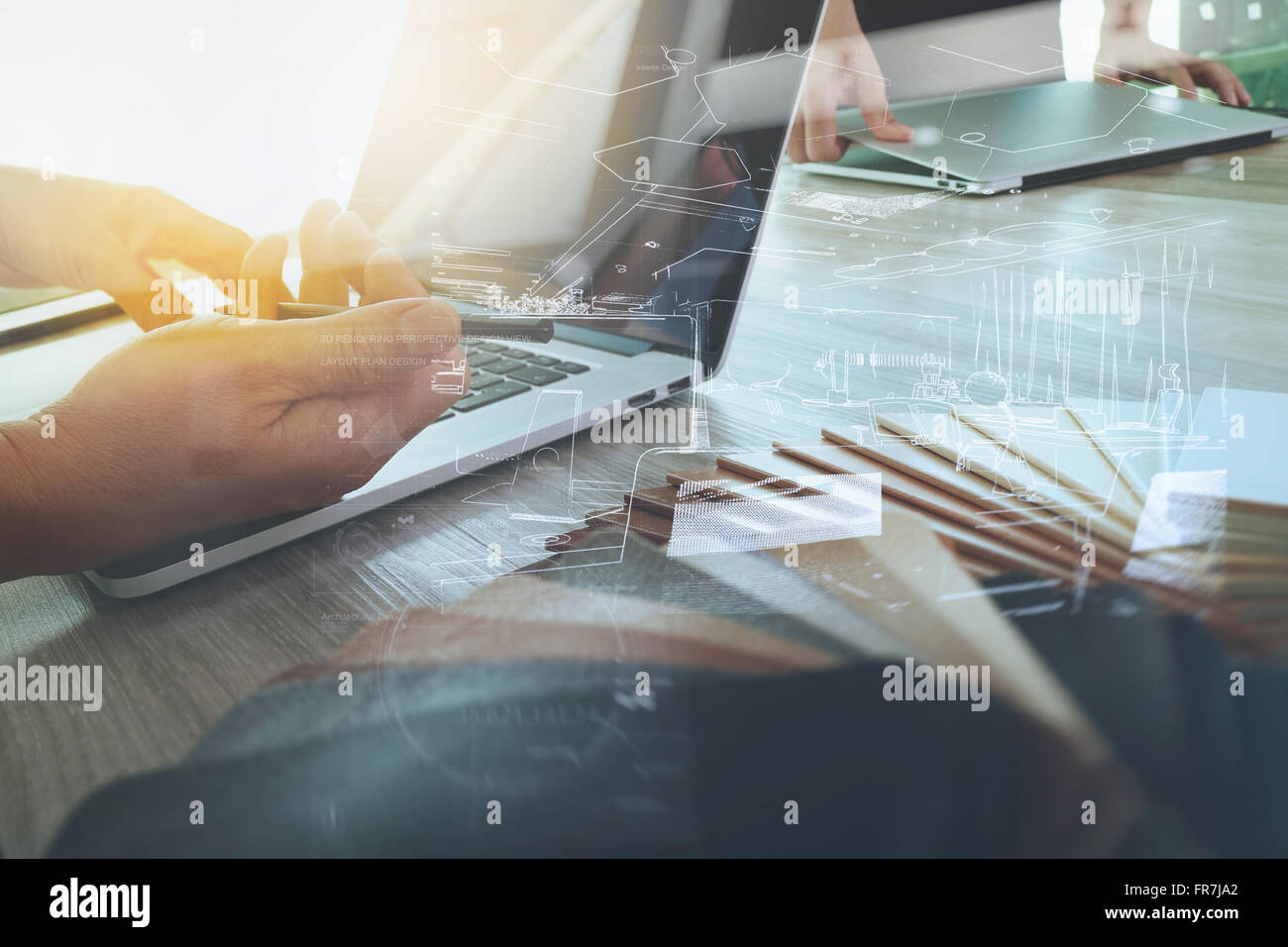 two colleagues interior designers discussing data with blank screen new ...