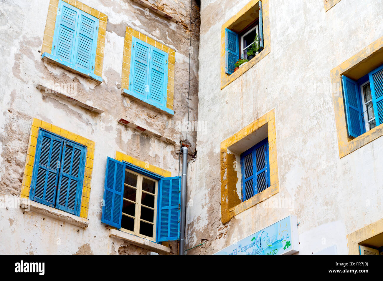 blue window in morocco africa old construction and brown wall ...