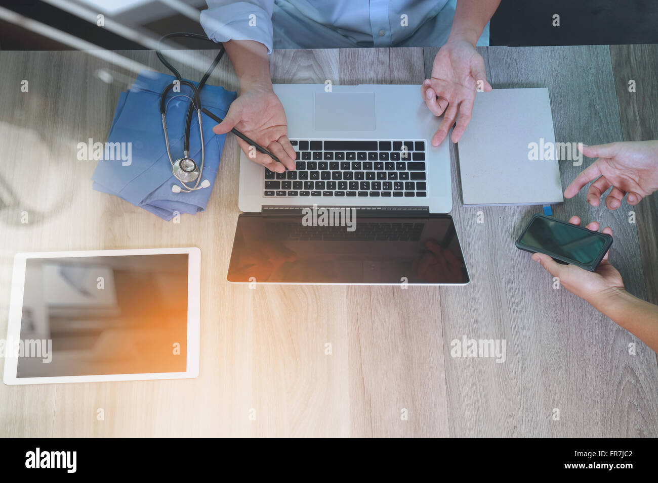 top view of Medicine doctor hand working with modern computer and ...