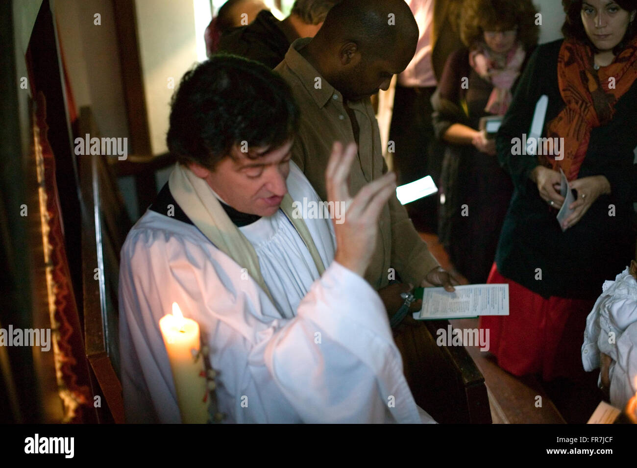Father Richard Williams gives a Blessing Stock Photo - Alamy