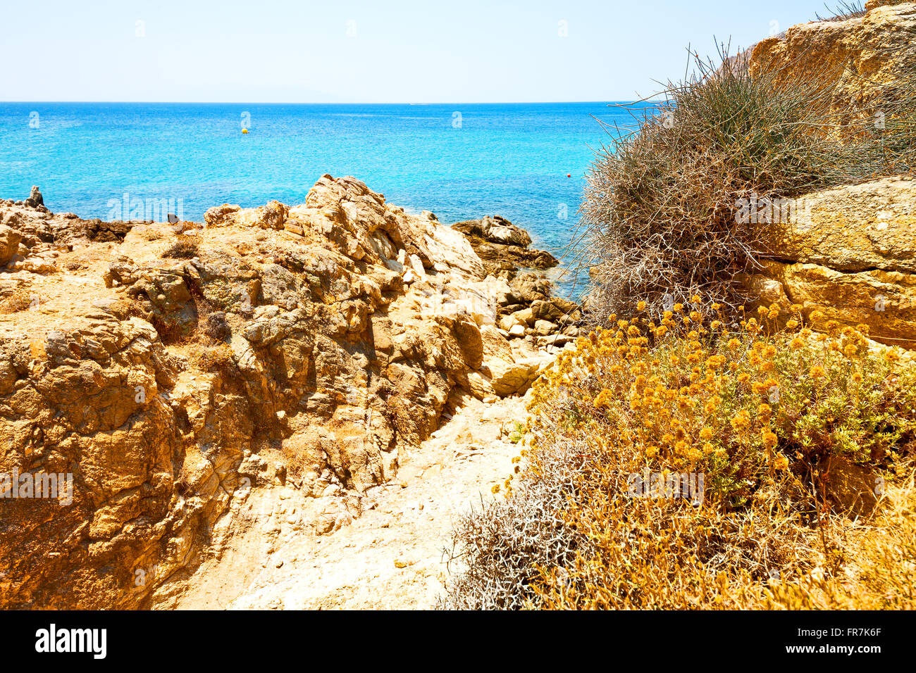 in greece the mykonos island rock sea and beach sky Stock Photo - Alamy