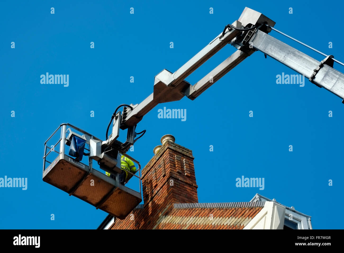 Man on cherry picker hi-res stock photography and images - Alamy