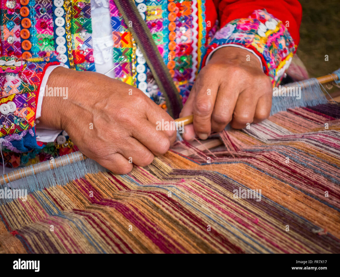 WASHINGTON, DC, USA - Woman demonstrates weaving with backstrap loom ...