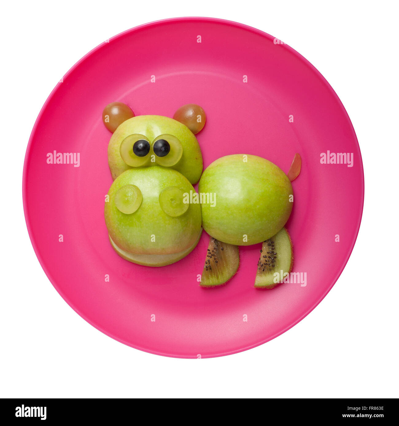 Funny hippo made of apple on pink plate Stock Photo - Alamy