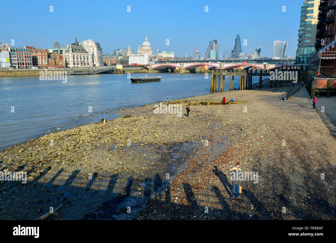London, England, UK. River Thames at low tide, from the South Bank ...