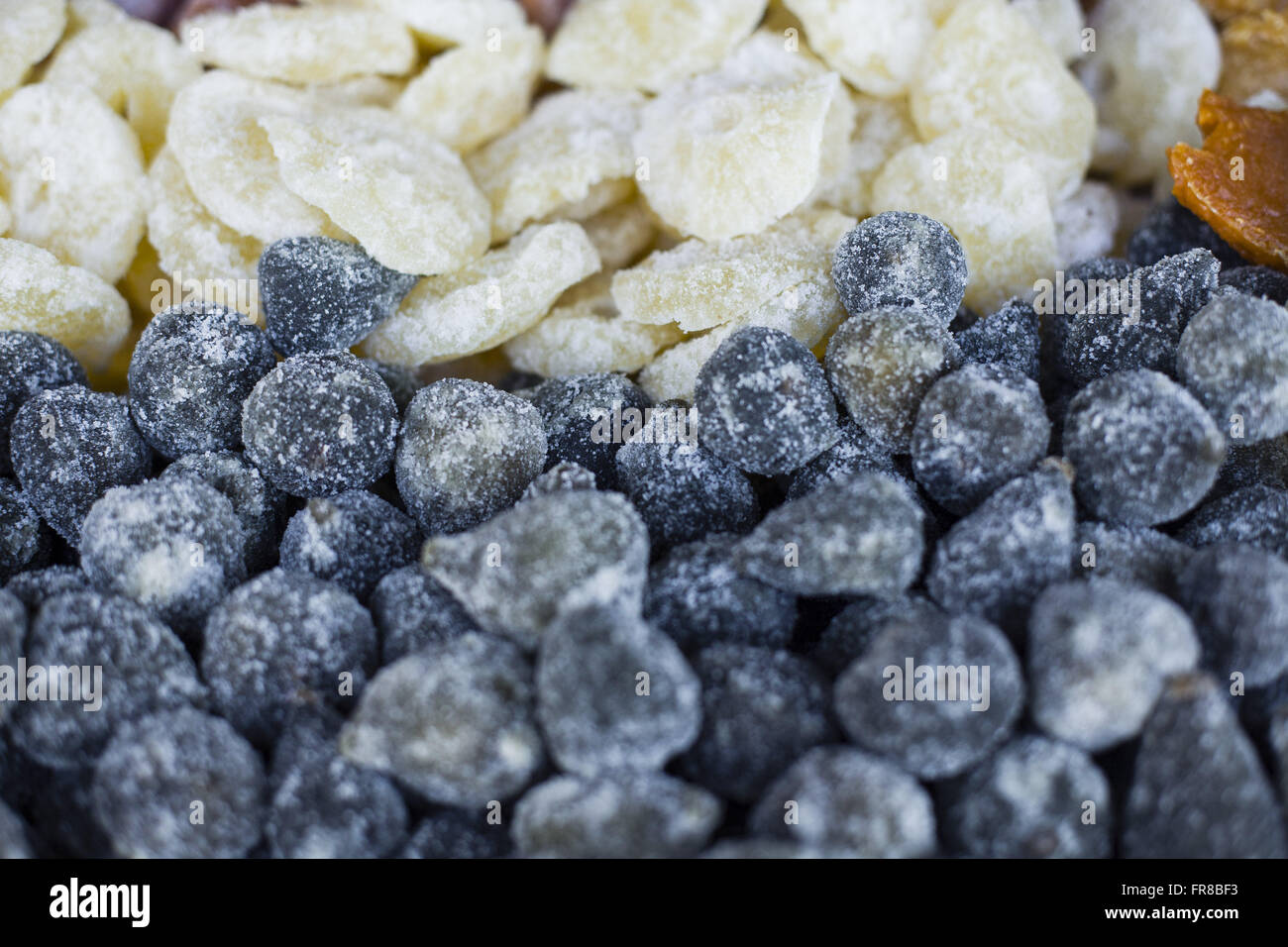 Sweet pineapple and figs - typical candy miners Stock Photo - Alamy