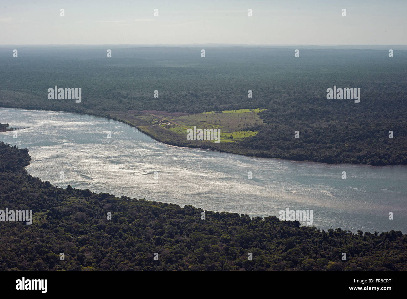 Aerial view of indigenous village on the bank of the Juruena River ...