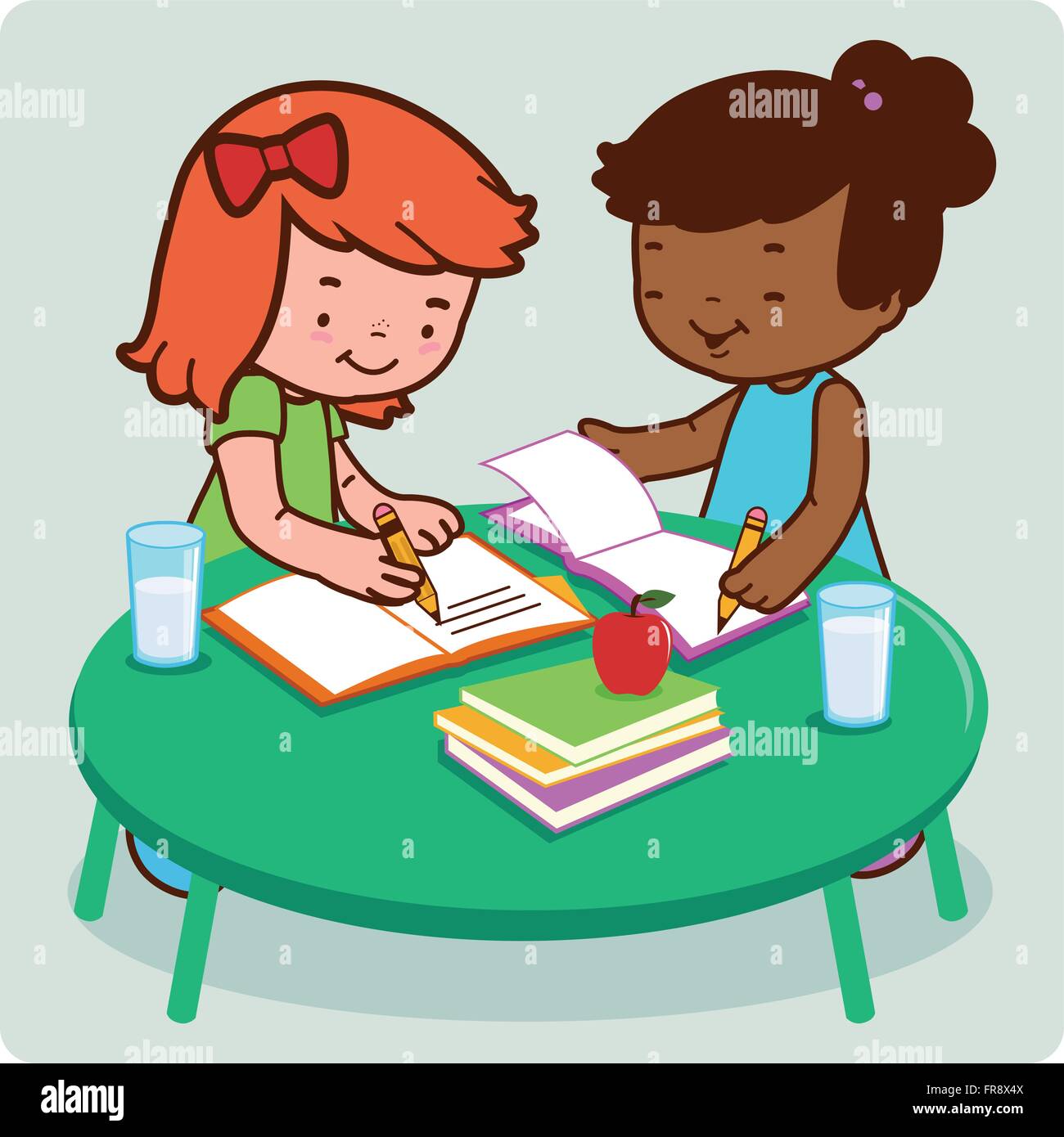 Students at a desk doing their homework. Kids students study in the ...