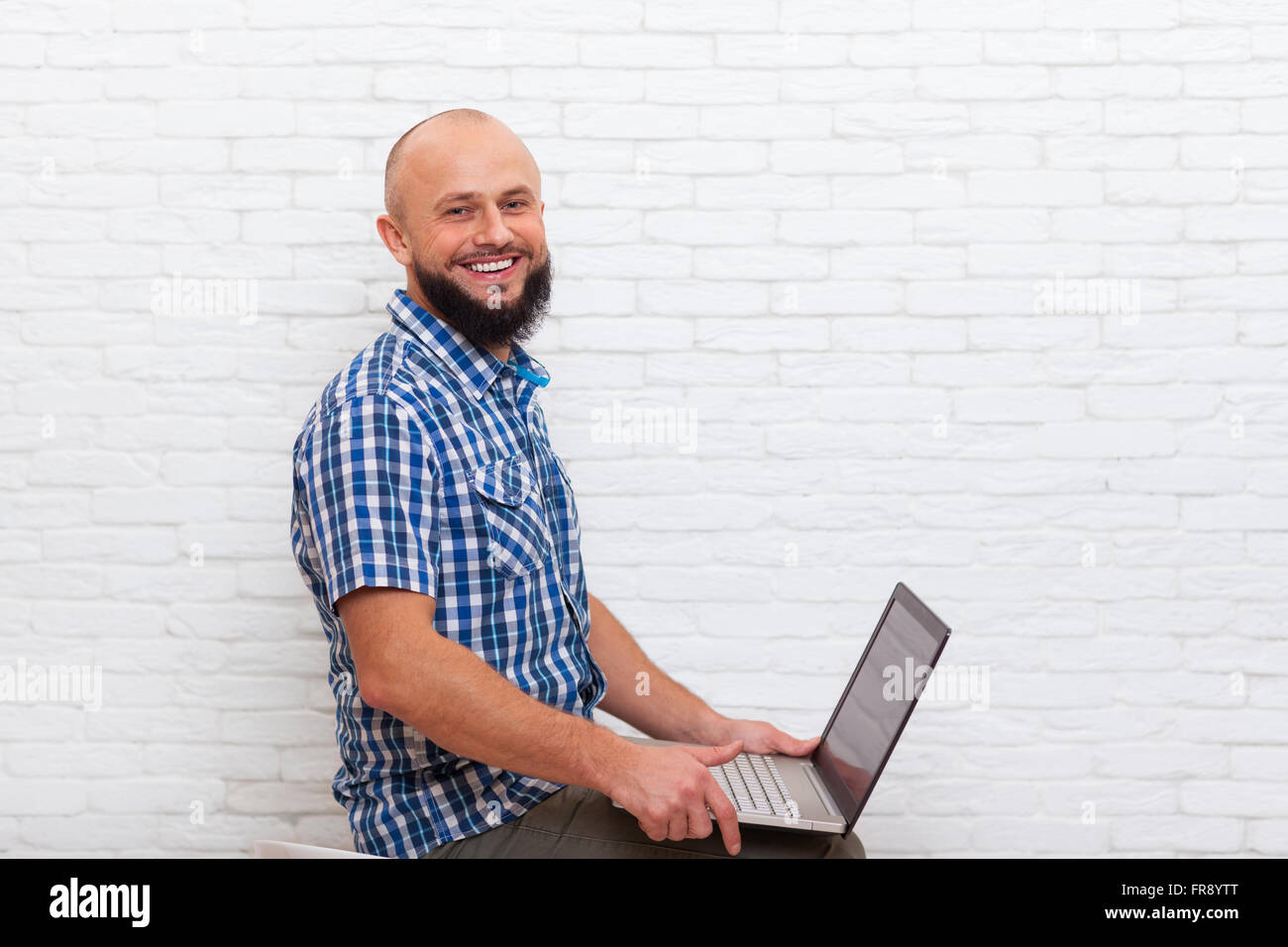 Casual Bearded Business Man Sitting Hold Laptop Online Communication ... Casual Bearded Business Man Sitting Hold Laptop Online Communication ...