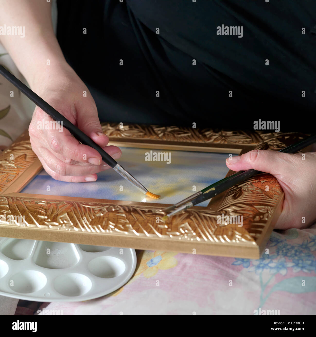 Female hands paint brush canvas hi-res stock photography and images - Alamy