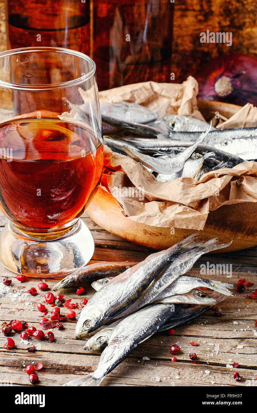 Glass of beer,smoked sprat,spices in traditional rustic style Stock ...