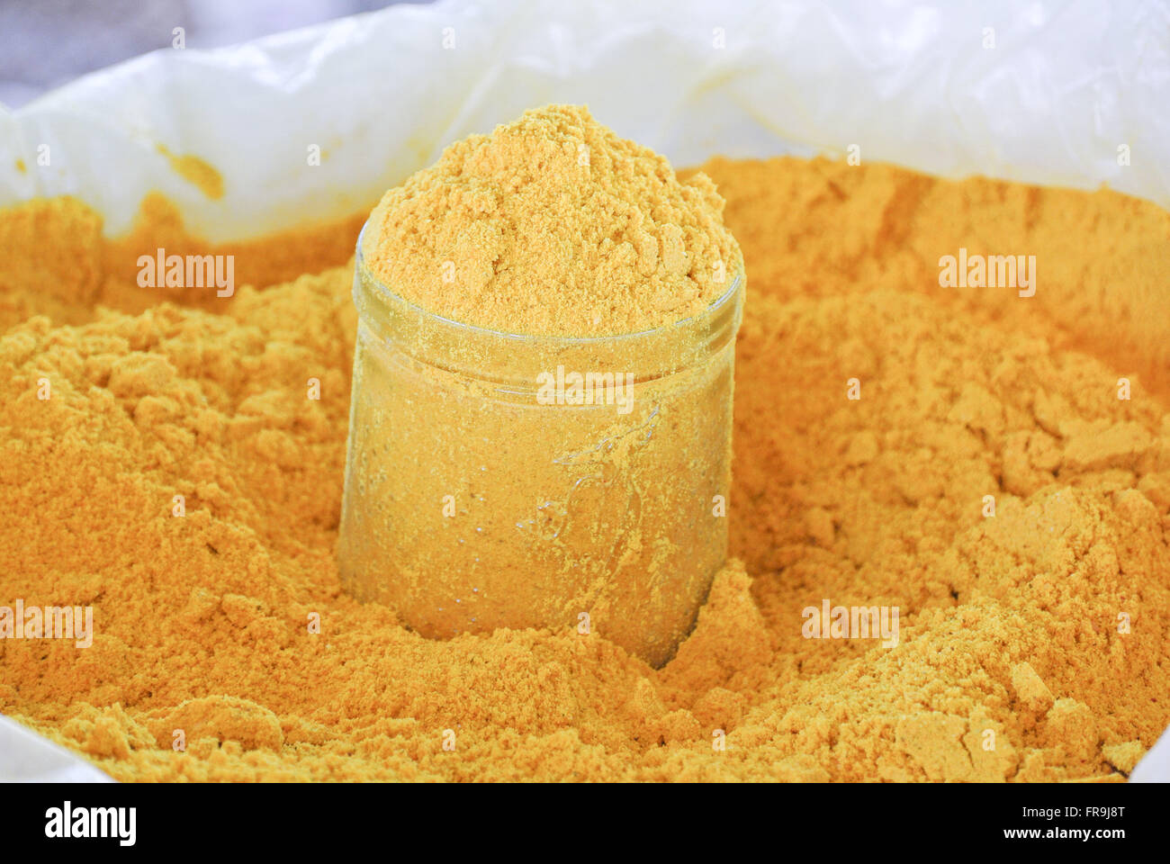 Cassava flour sale at street market Stock Photo - Alamy