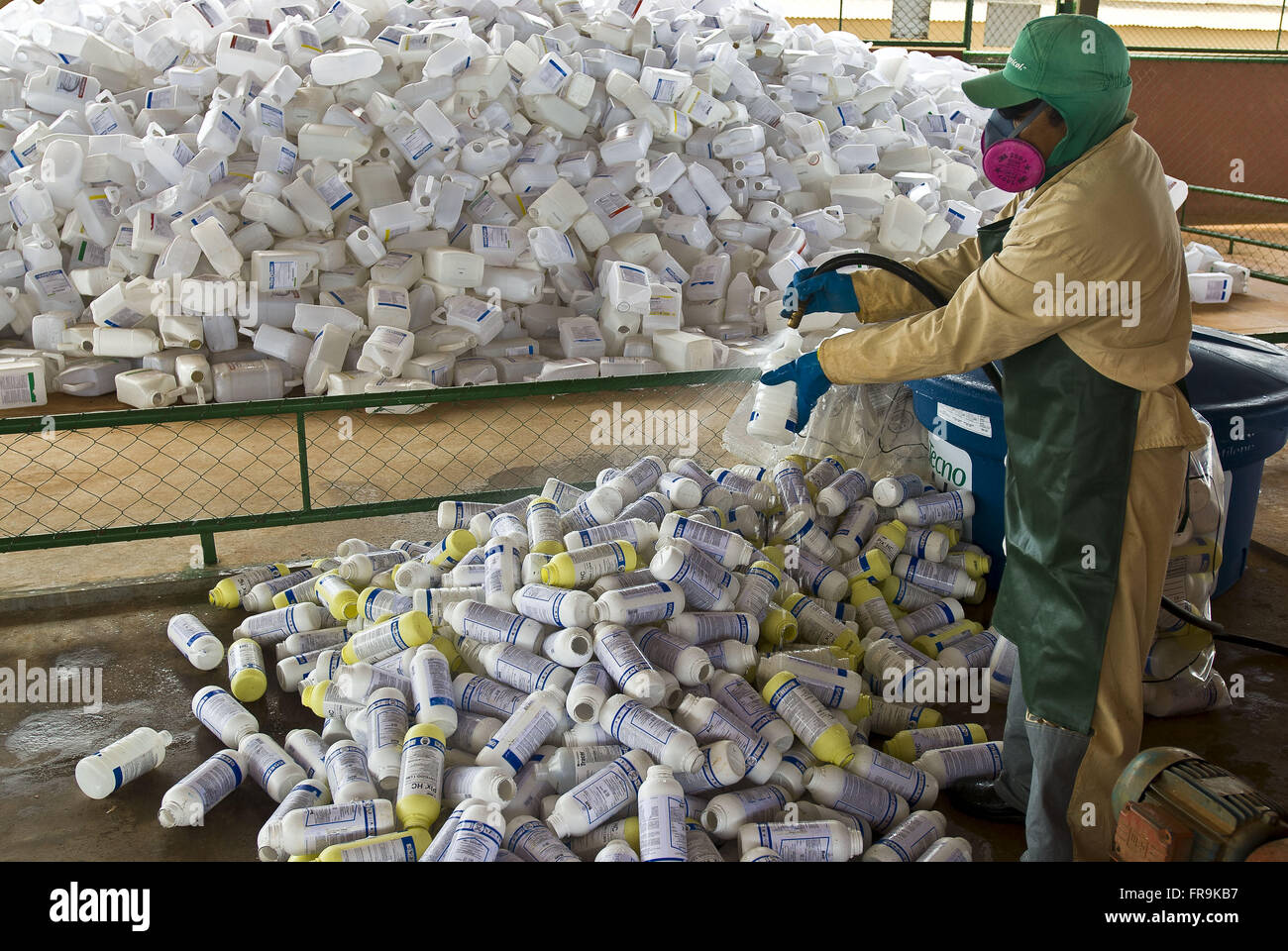 Pesticide containers being washed up on a farm in Costa Rica - Mato ...
