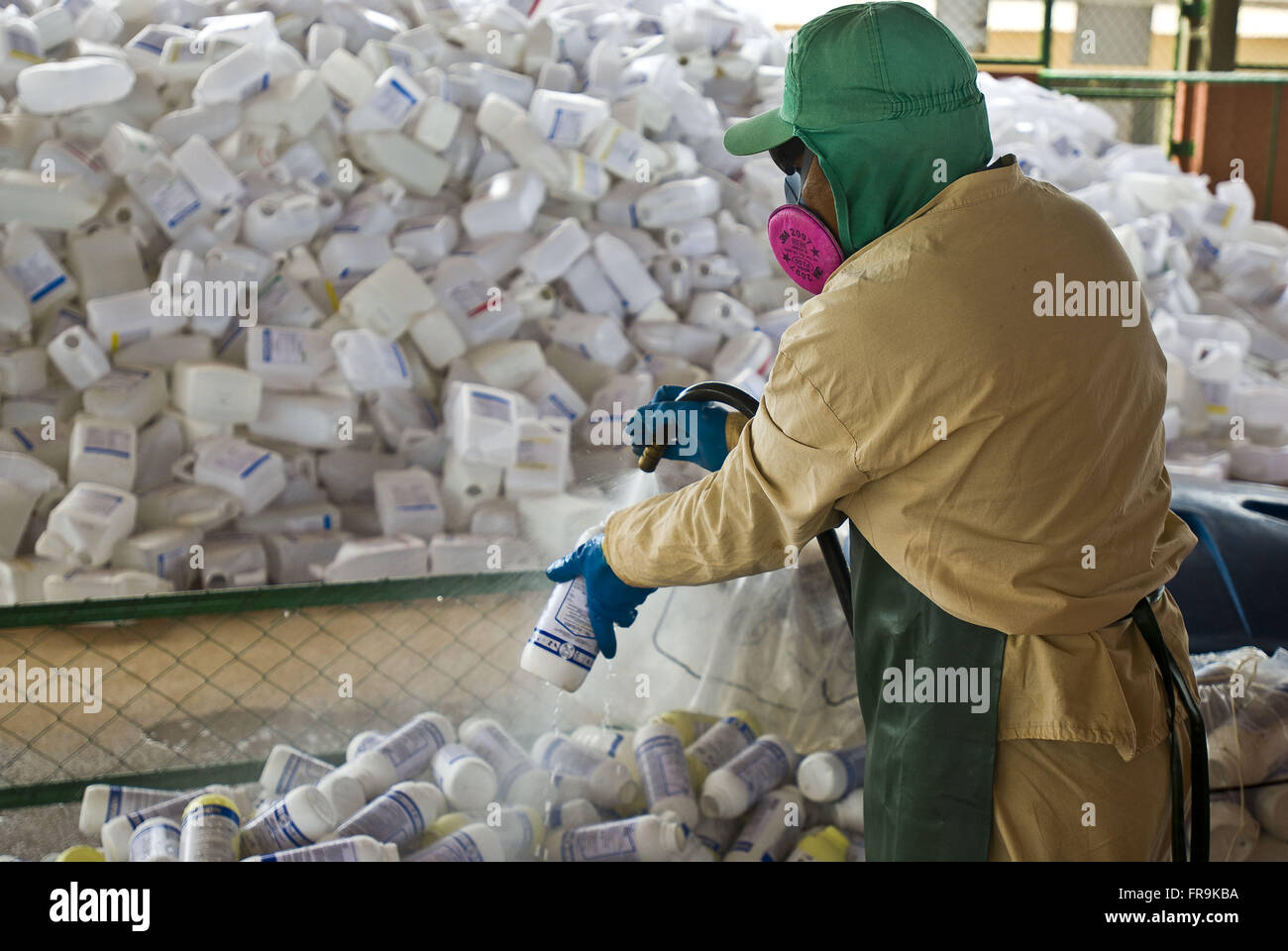 Pesticide containers being washed up on a farm in Costa Rica - Mato ...