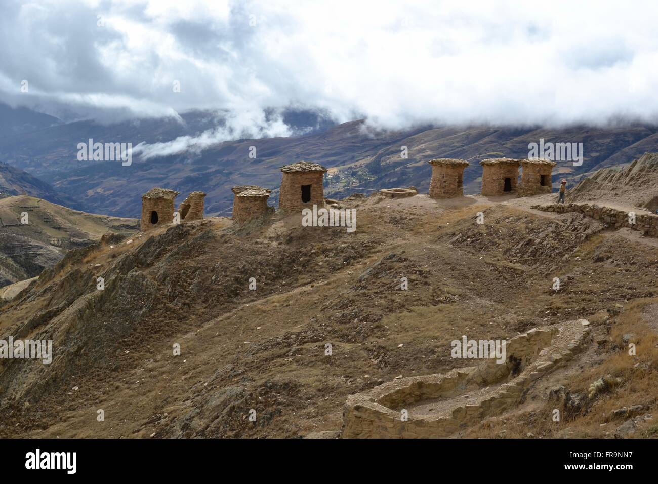 Structures on mountain in Peru Stock Photo - Alamy