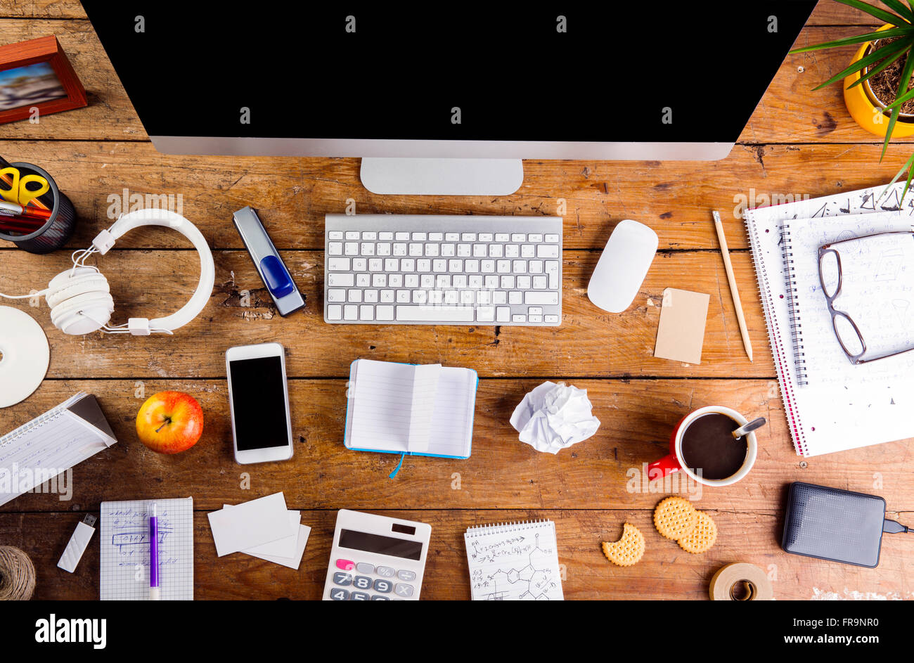 Desk with various gadgets and office supplies. Flat lay Stock Photo - Alamy