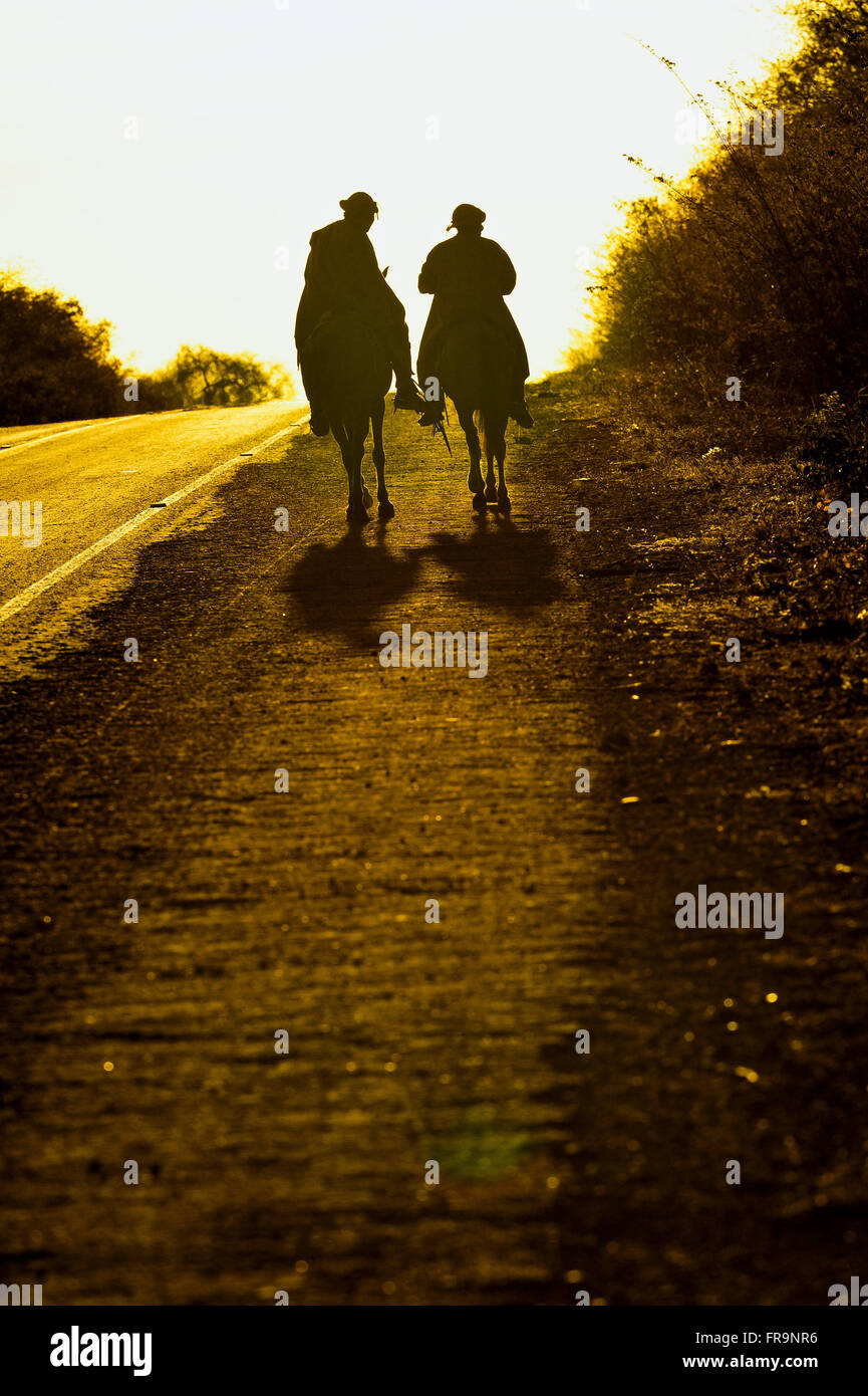 Two riding cowboys hi-res stock photography and images - Alamy