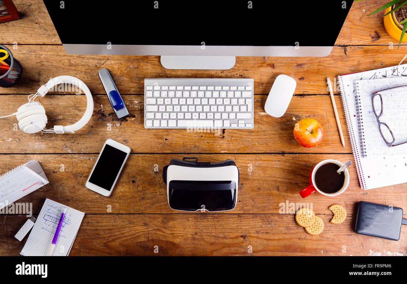 Desk with various gadgets and office supplies. Flat lay Stock Photo - Alamy