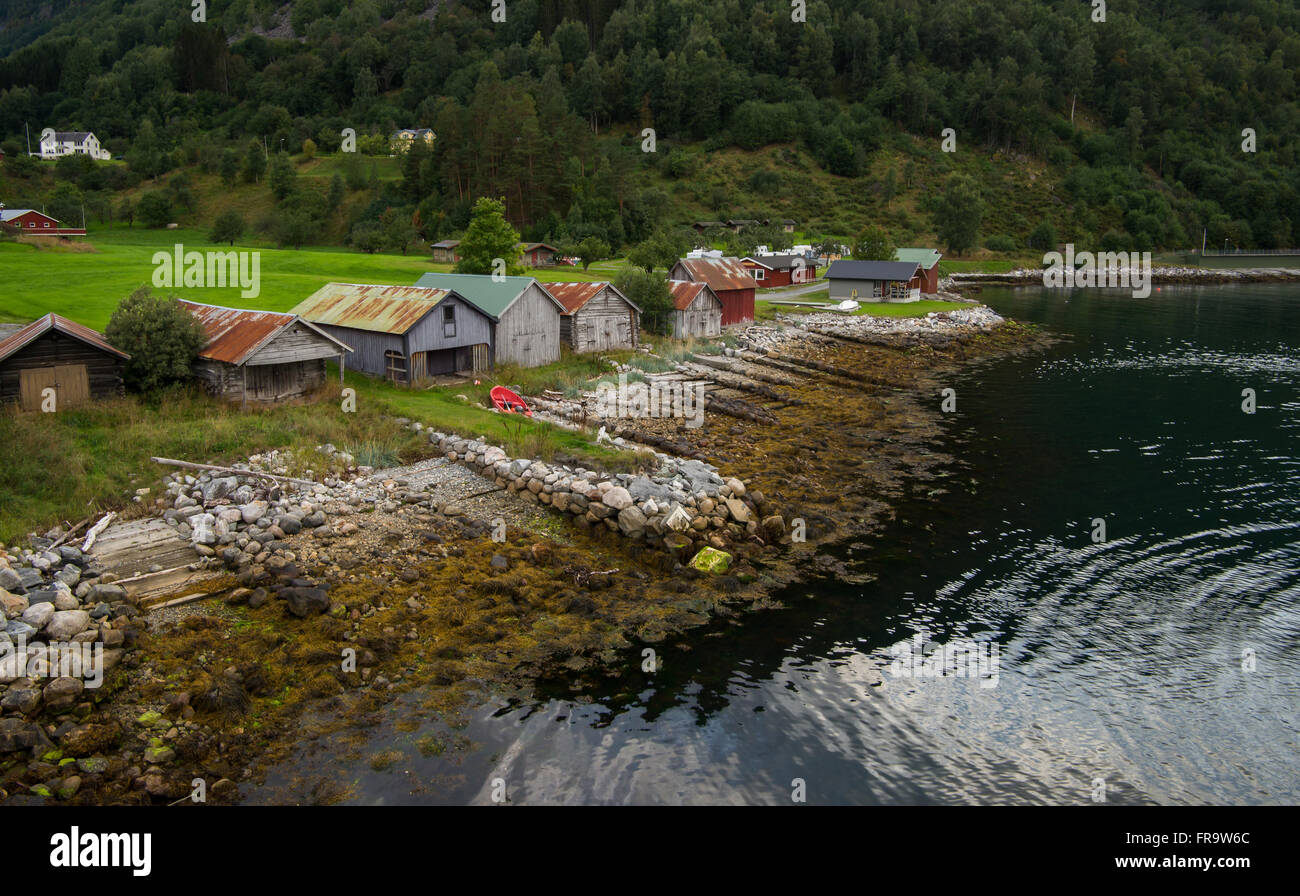 Boathouses on the coast of Norwegian fjord. Storfjorden. Eidsdal ...