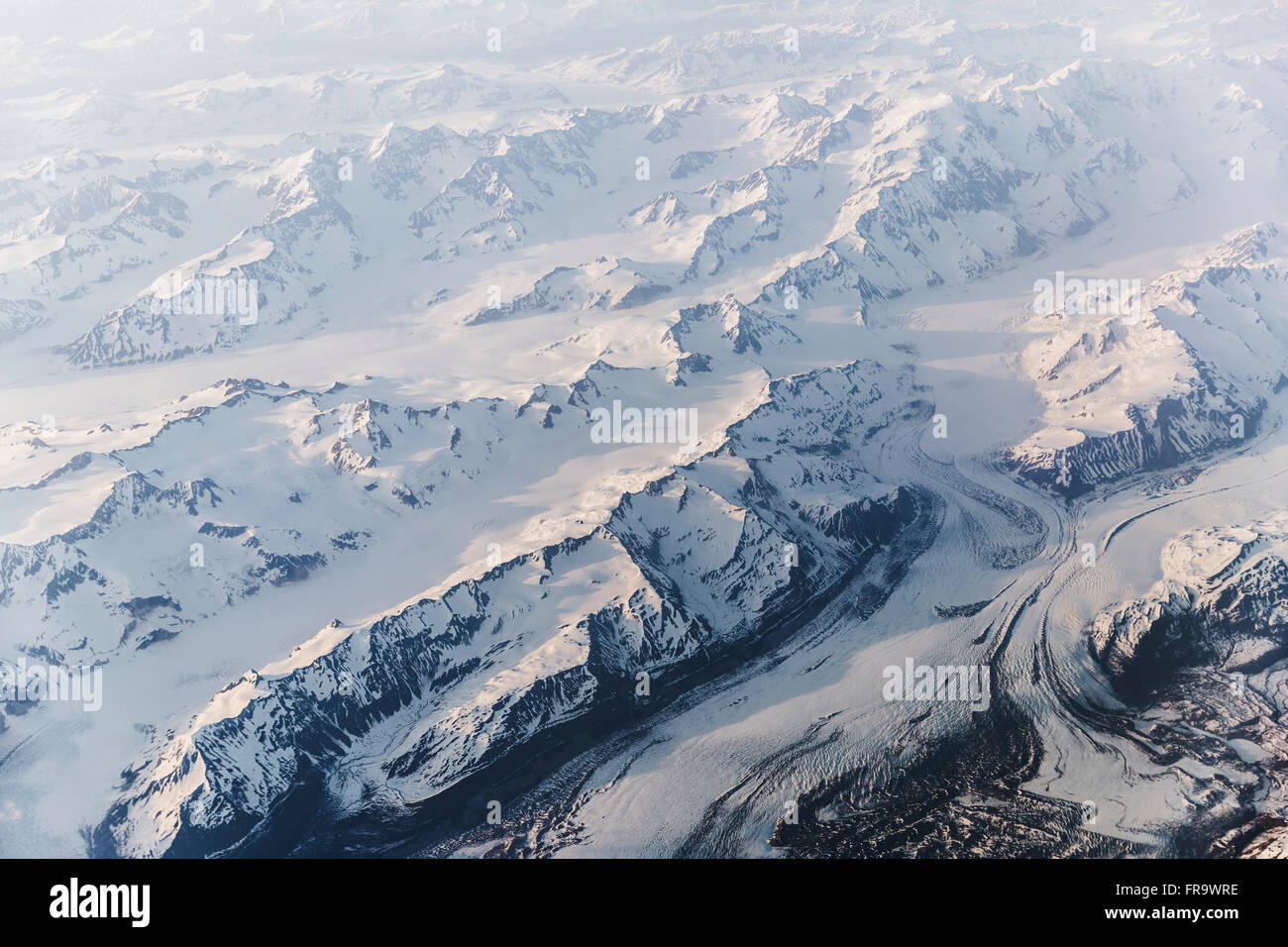 Aerial view of snow covered mountains and glaciers in the Coastal Range ...