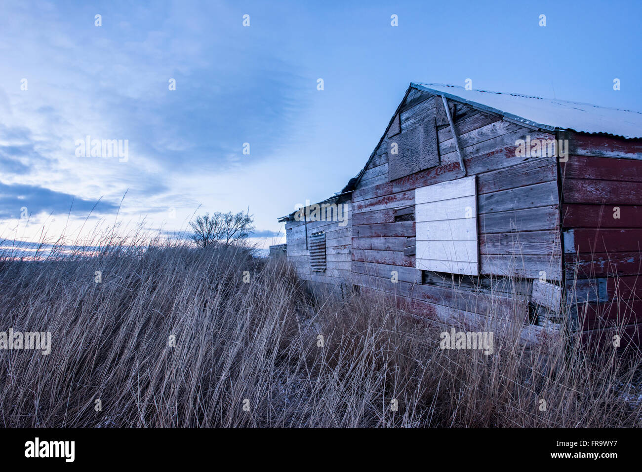 An old shed sits in twilight at the village of Igiugig, Alaska, at the ...