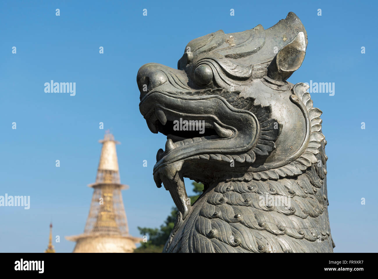 Chinthe guarding the Independence Monument in Maha Bandula Park in ...