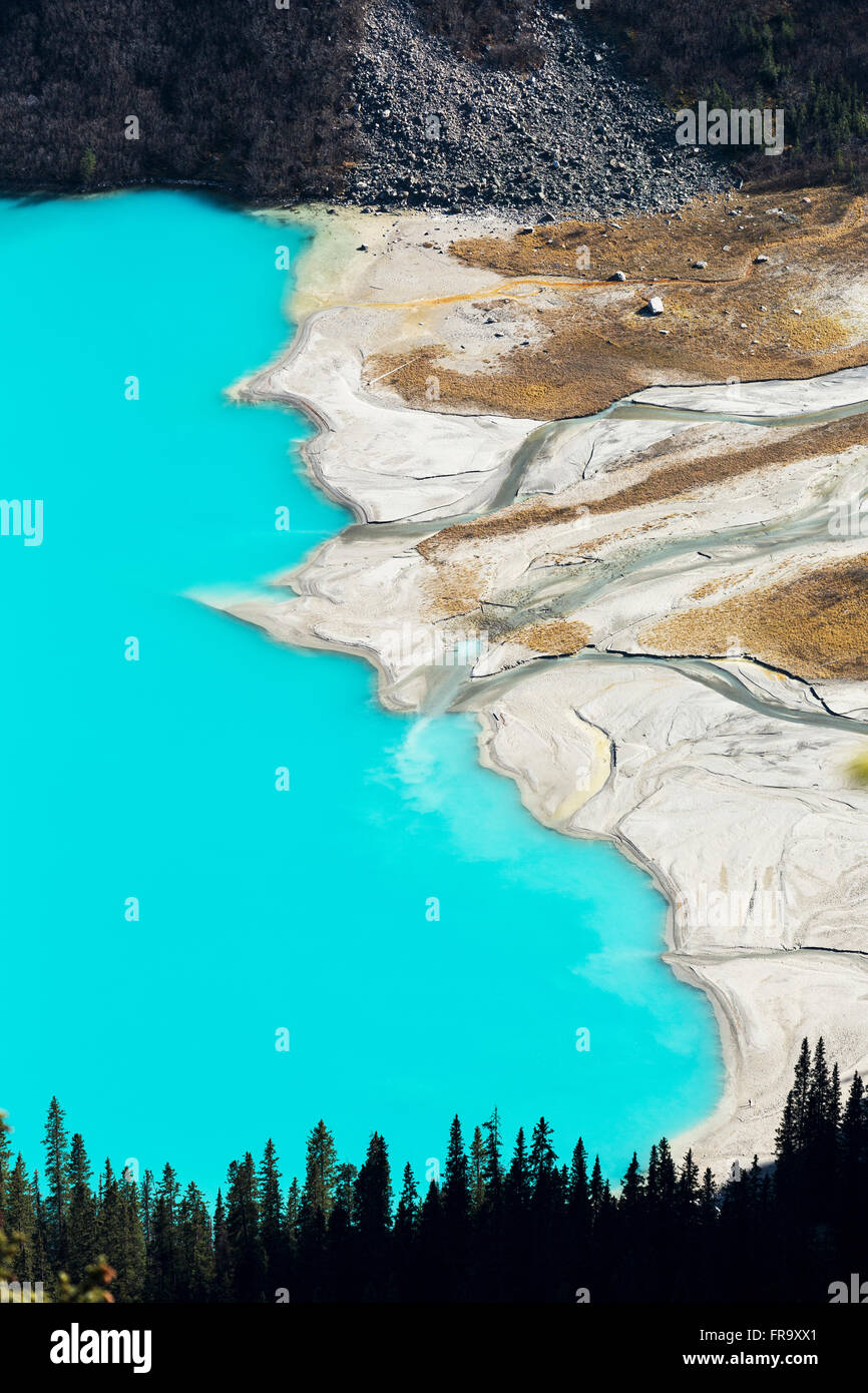 Overlooking high above an intense blue coloured lake with delta ...